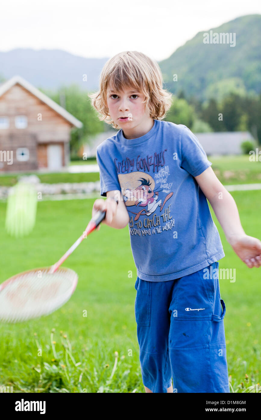 Boy playing badminton Stock Photo - Alamy