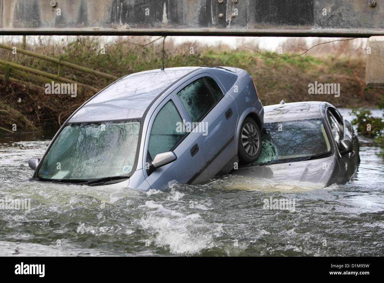 TWO CARS STUCK IN THE RIVER CAM,IN HINXTON,ESSEX,AFTER THEY DROVE ...
