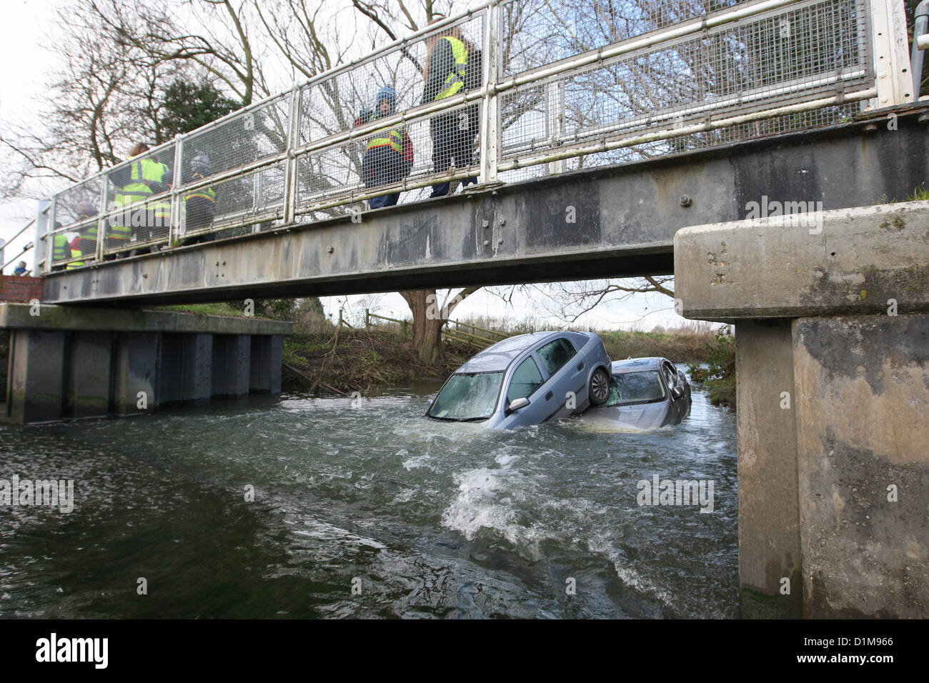 TWO CARS STUCK IN THE RIVER CAM,IN HINXTON,ESSEX,AFTER THEY DROVE ...