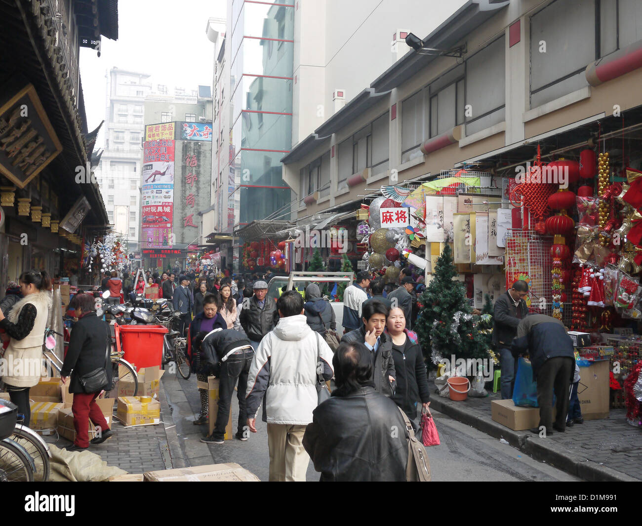 busy street alley shops chinese people walking Stock Photo - Alamy