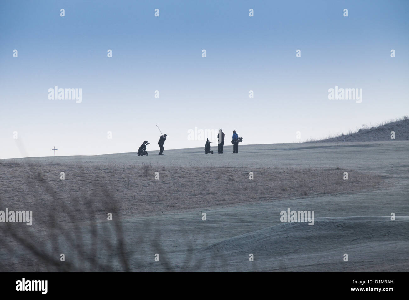 WALKERS ON DUNSTABLE DOWNS BEDFORDSHIRE IN THE SNOW AND COLD WEATHER ...