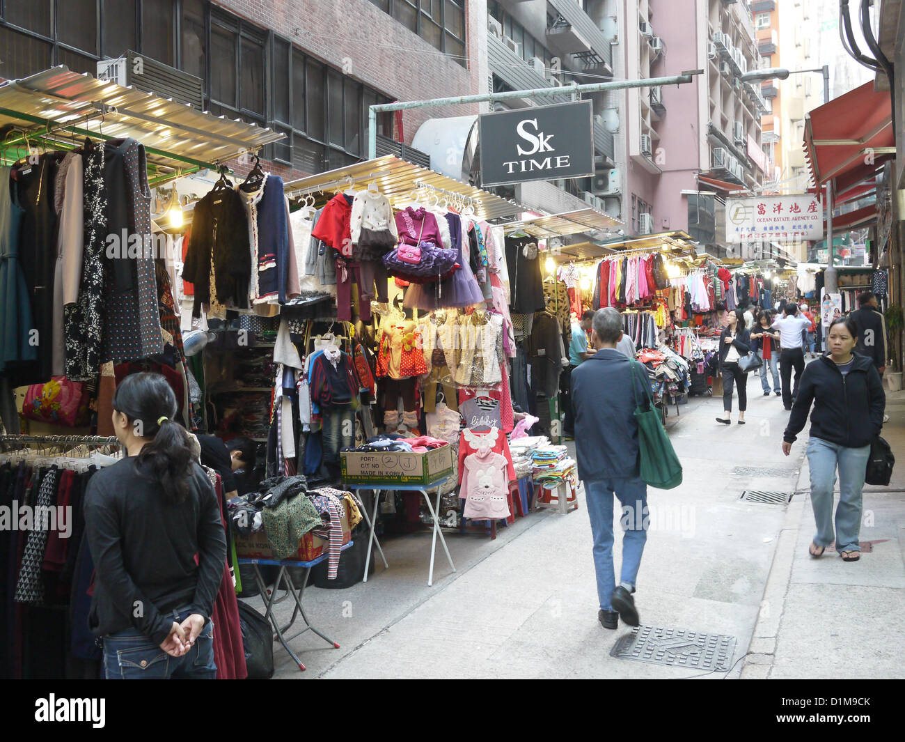 outdoor street vendor selling clothes asia Stock Photo - Alamy
