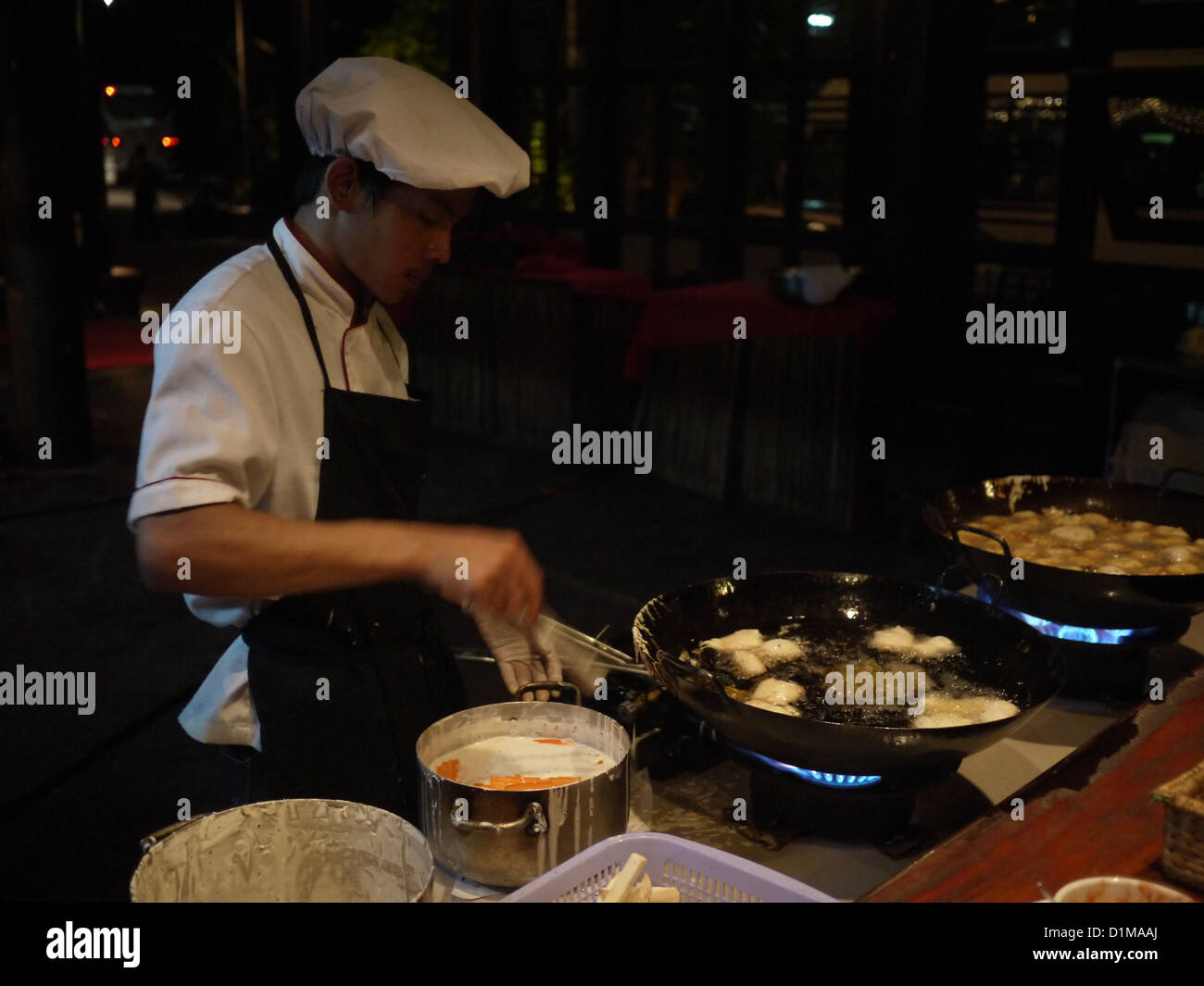 Asian male making deep fried appetizer restaurant Stock Photo - Alamy