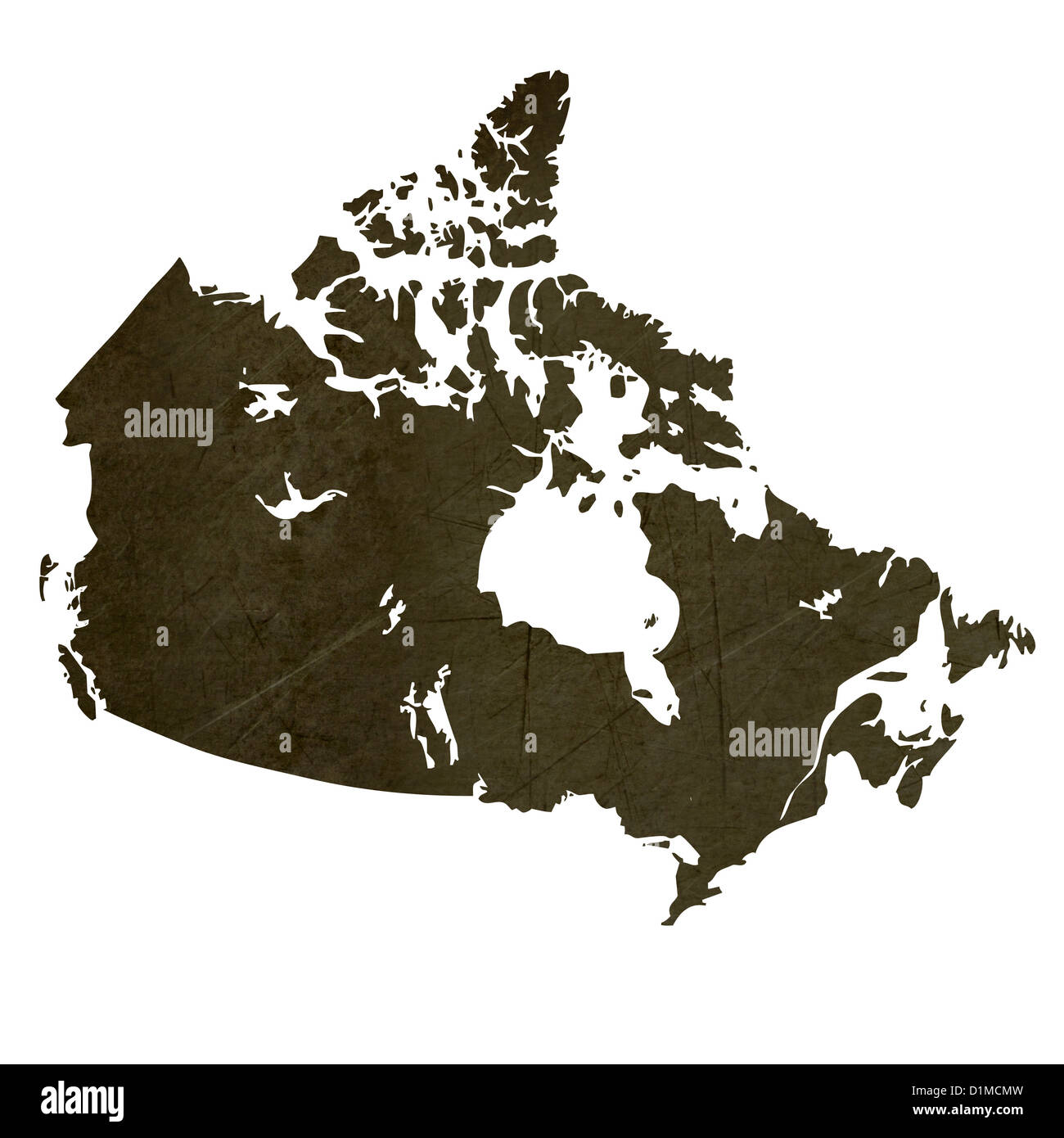 Dark silhouetted and textured map of Canada isolated on white ...
