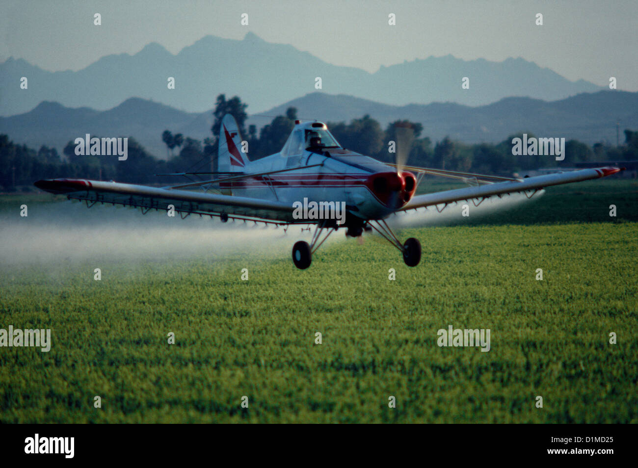 Plane spraying insecticide hi-res stock photography and images - Alamy