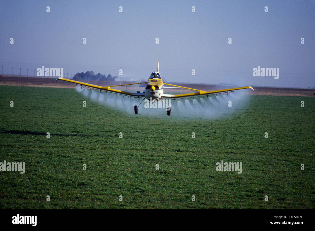 Plane crop spraying fields hi-res stock photography and images - Alamy