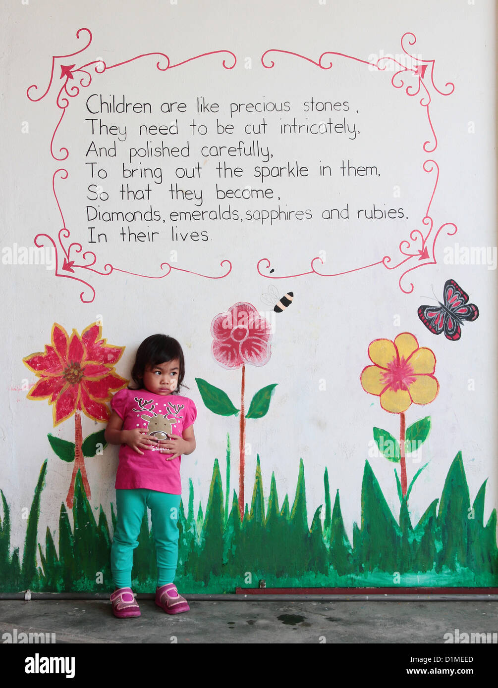 Dec. 28, 2012 - Klang, SELANGOR, Malaysia - A girl waiting outside of ...