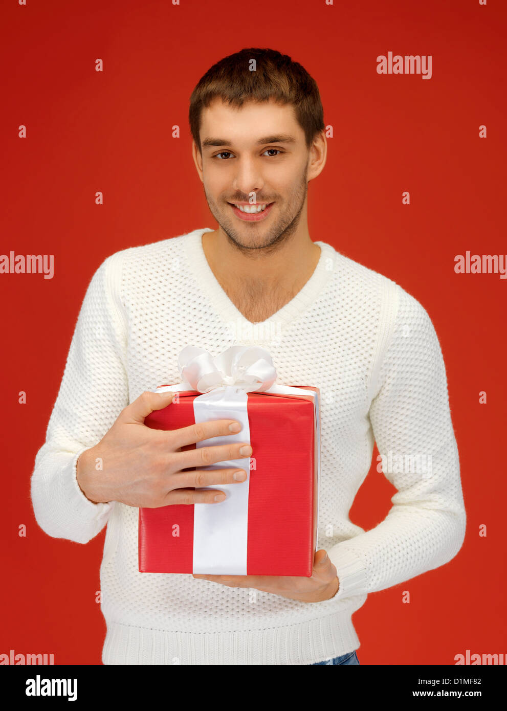 handsome man with a gift Stock Photo - Alamy