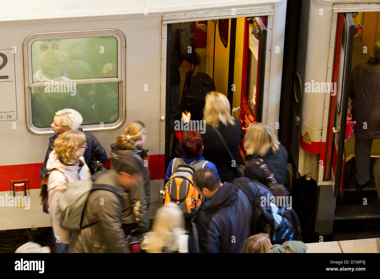 Passengers embarking a Train in the main Railway Station in Berlin ...