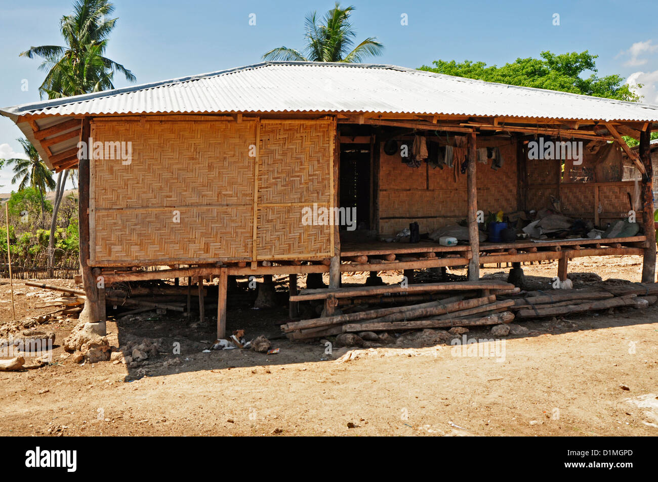 INDONESIA, Sumba, Maudolung, typical house with corrugated iron roof ...