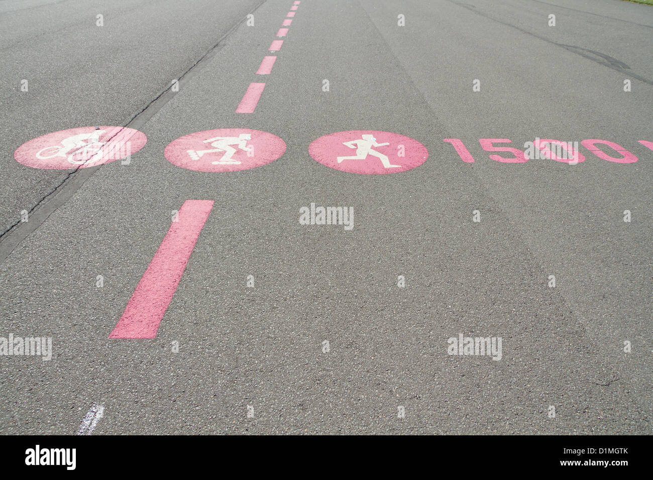 Red Signs on the Runway on the former Airport Tempelhof in Berlin which ...