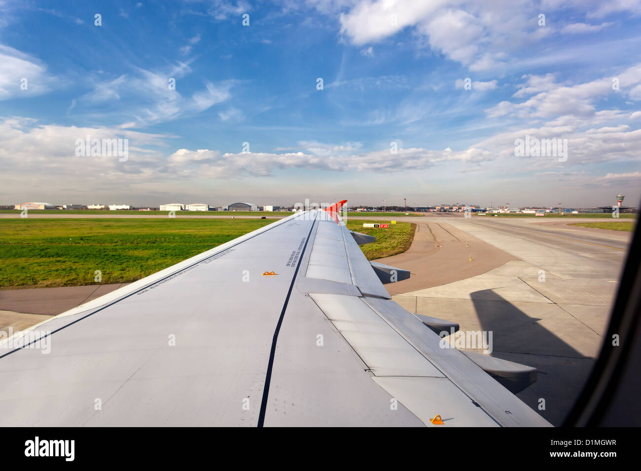 Airplane on landing strip, ready to flight Stock Photo - Alamy