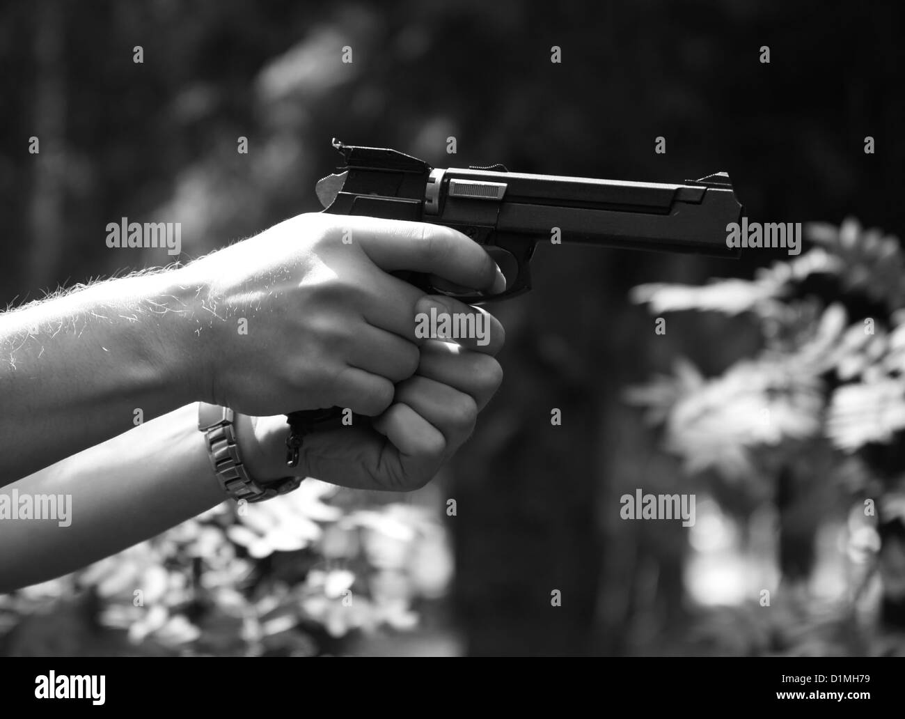 Weapon in mans hand hi-res stock photography and images - Alamy