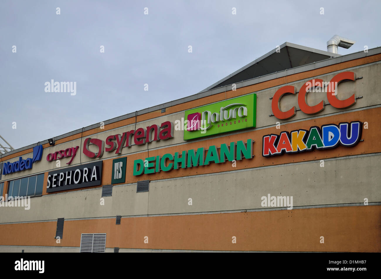 Advertisements on the wall of Carrefour supermarket, brands logos, ads ...