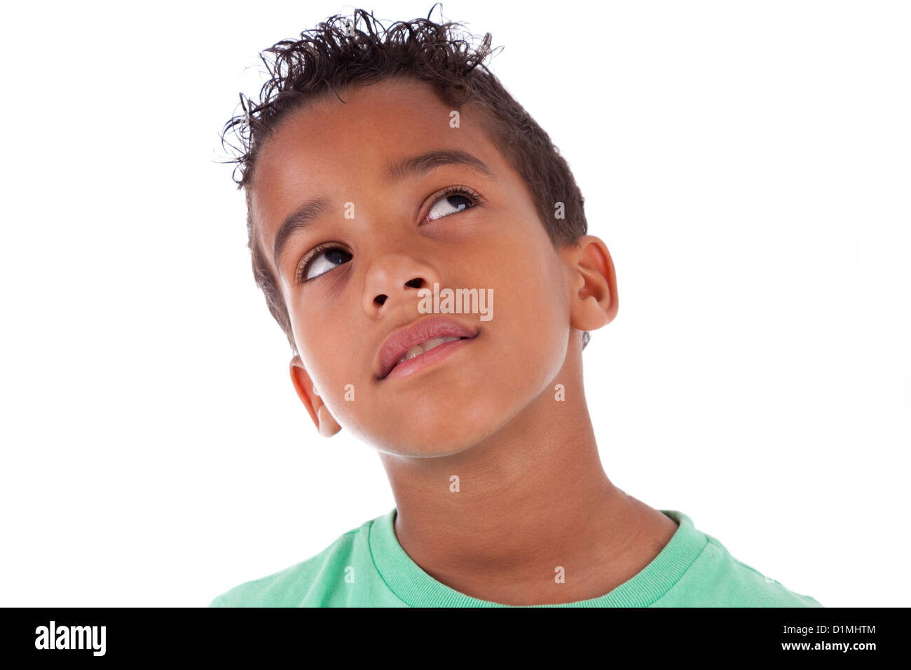 Portrait of a cute african american little boy looking up, isolated on ...