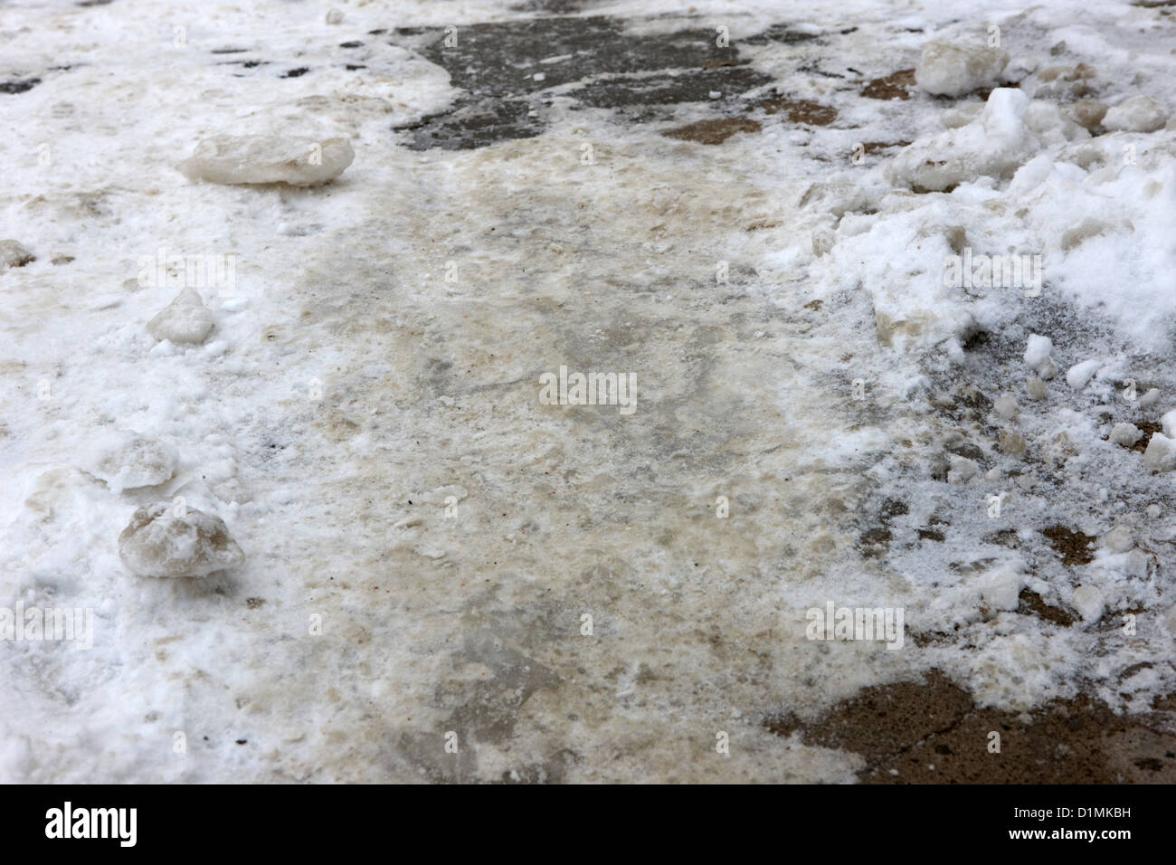 compacted snow and ice icy frozen sidewalk Saskatoon Saskatchewan ...