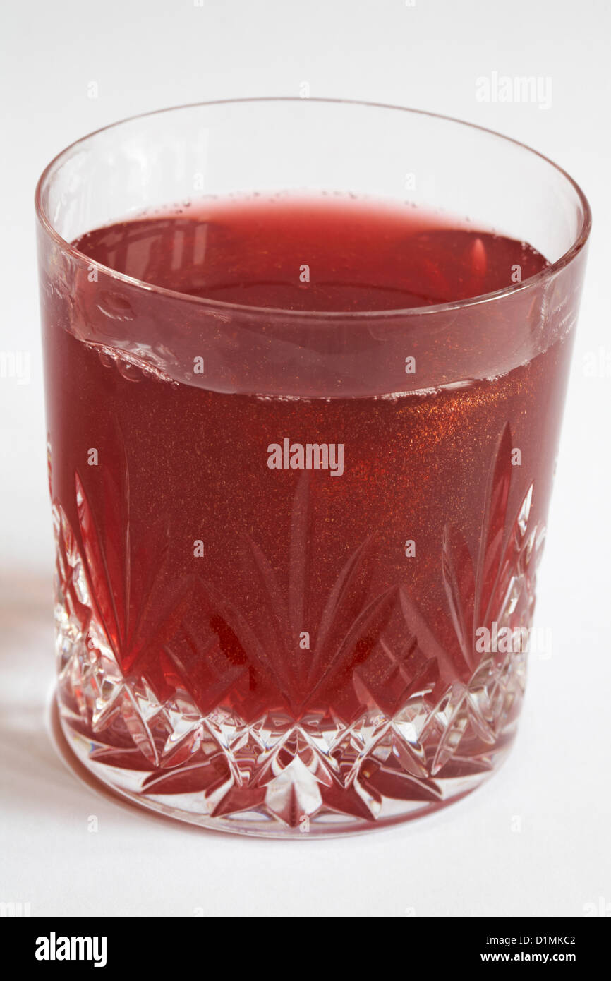 Glass of Glitter Berry J2O soft drink isolated on white background ...