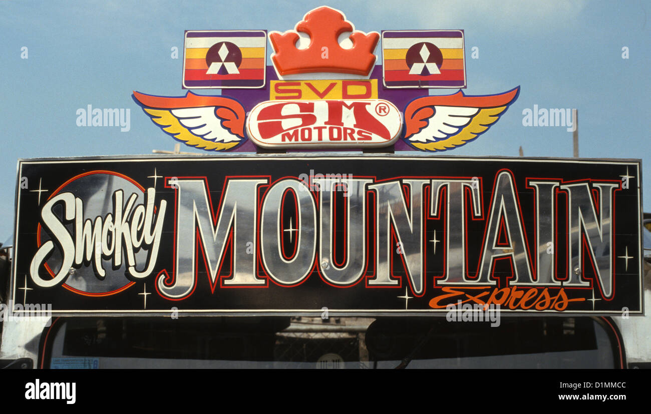 Jeepney public transport with Smokey Mountain sign in Manila ...