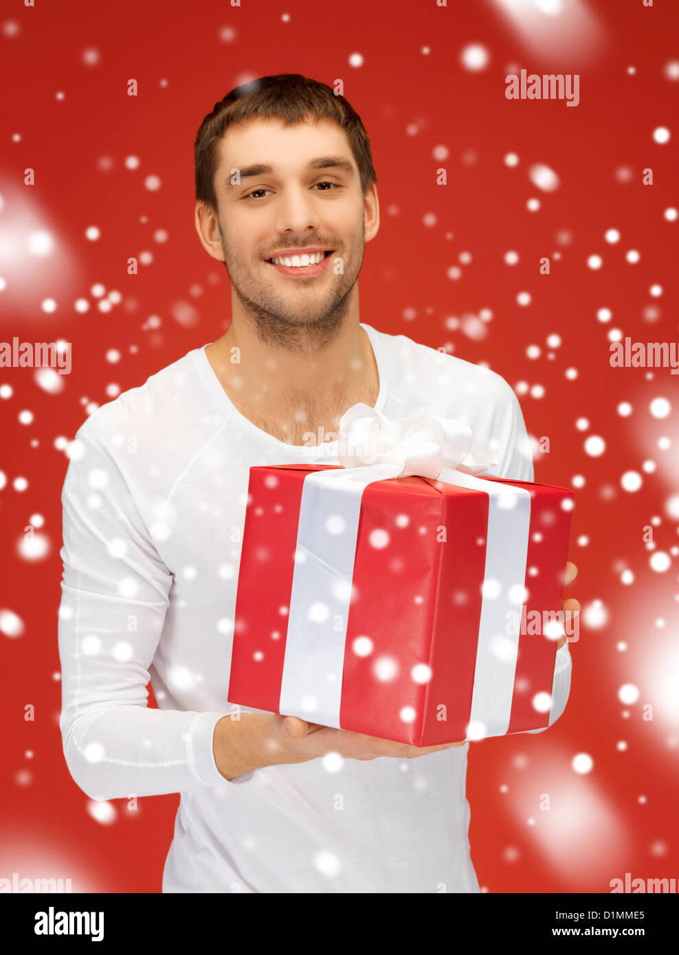 handsome man with a gift Stock Photo - Alamy