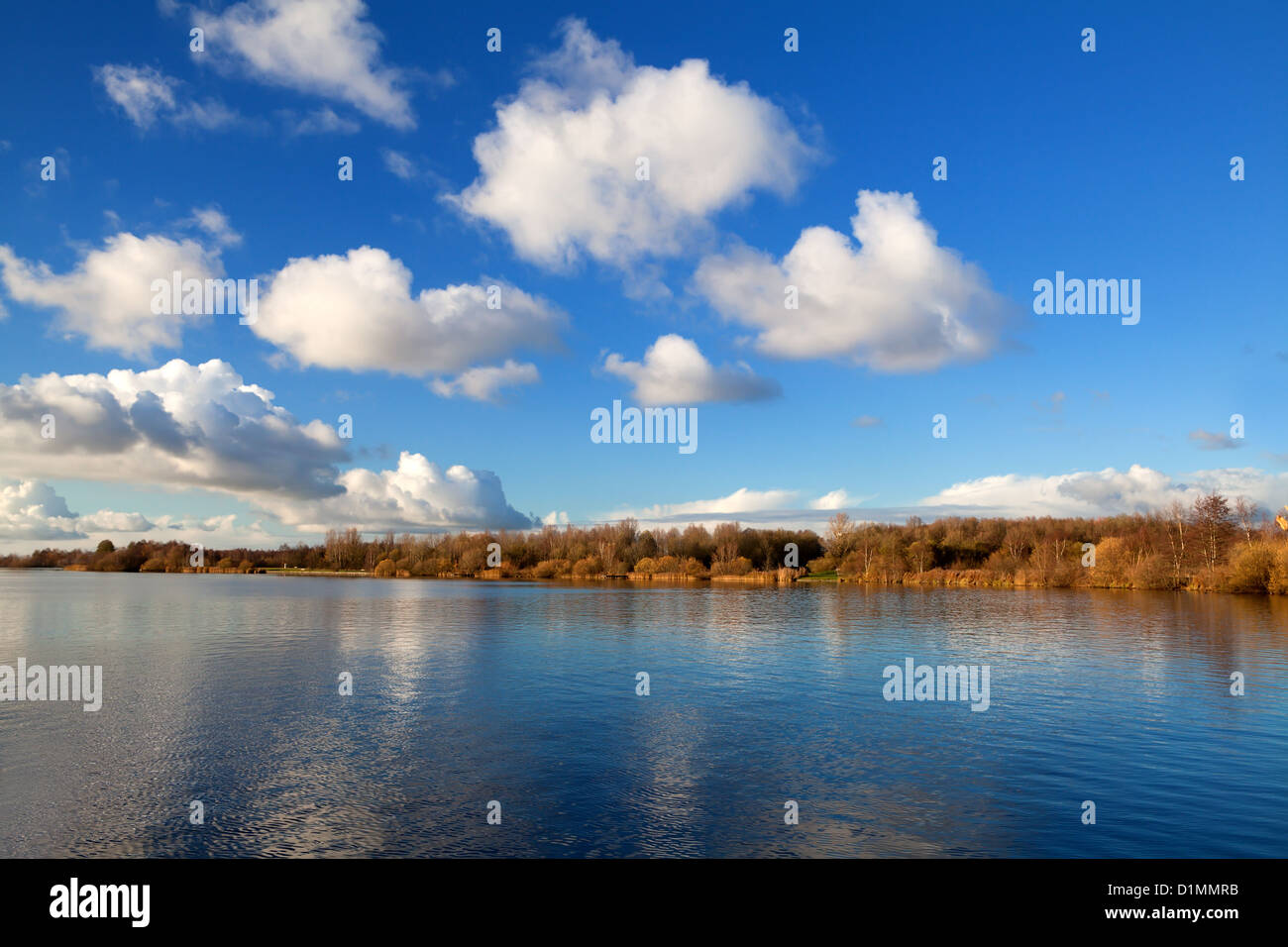 beautiful cloudscape over big blue lake Stock Photo - Alamy