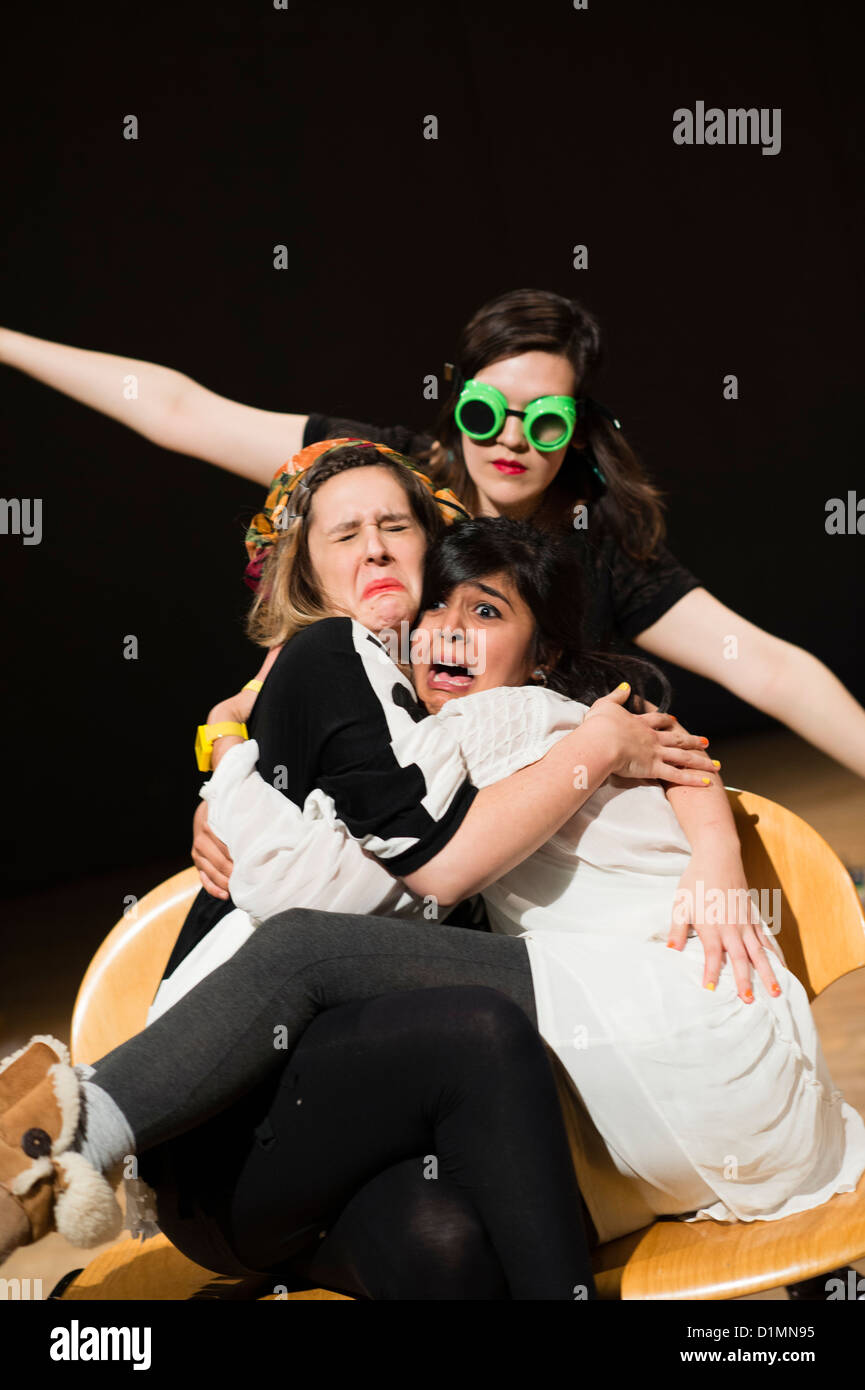 Three young women performing a devised improvised comedy theatre act ...