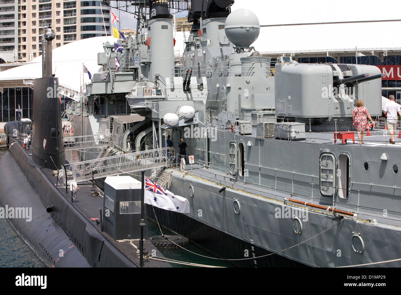 hmas onslow submarine moored alongside hmas vampire, a destroyer, at ...