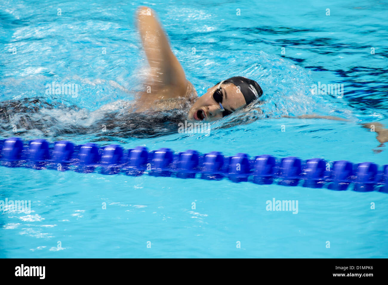 Female swimmer in freestyle action Stock Photo - Alamy