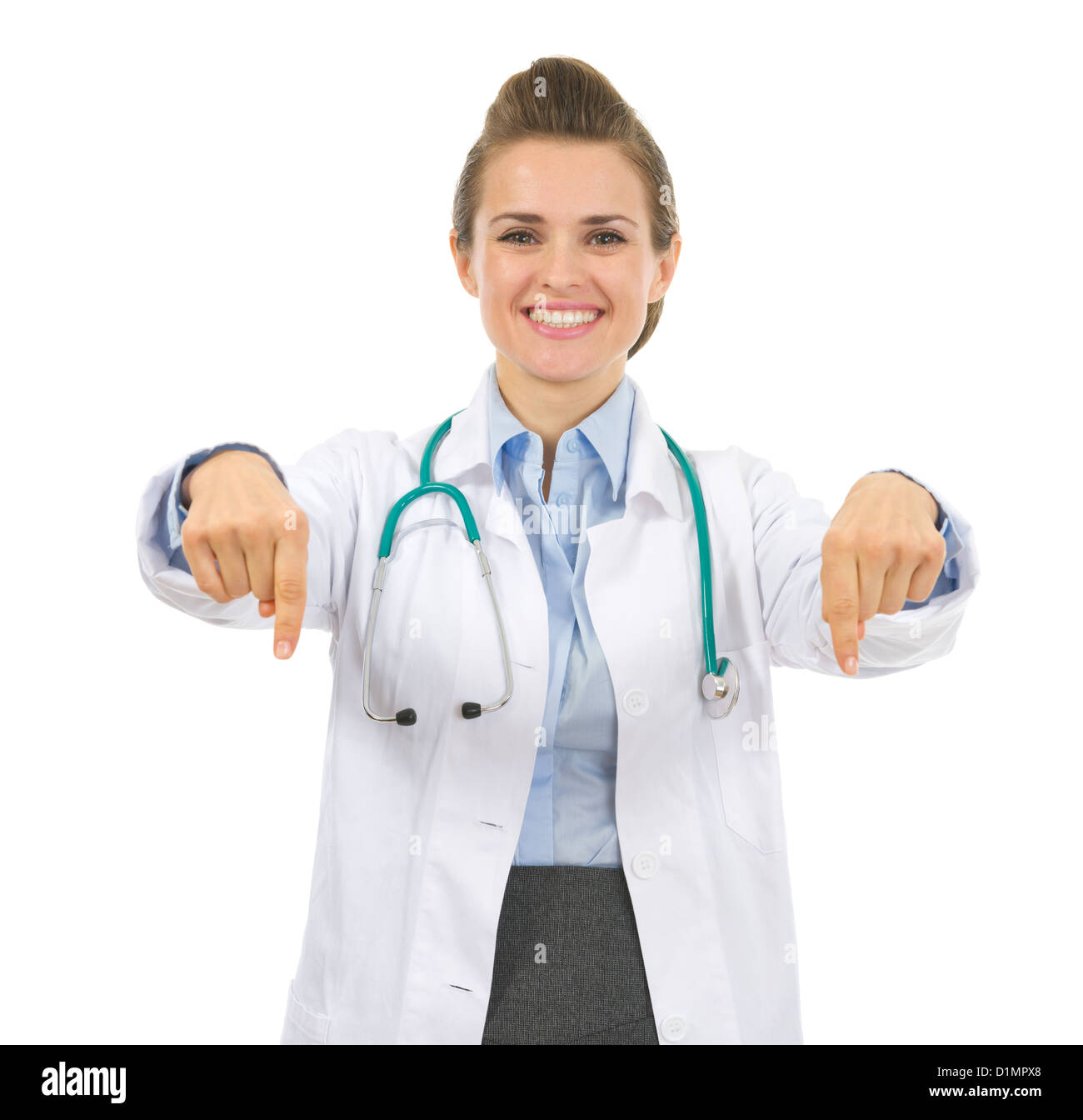 Smiling medical doctor woman pointing down Stock Photo - Alamy