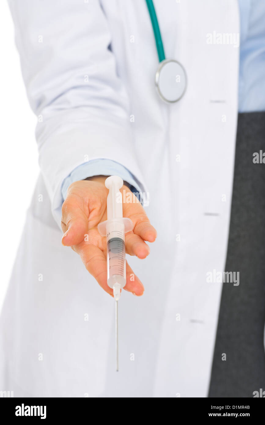 Closeup on hands of medical doctor giving syringe Stock Photo - Alamy