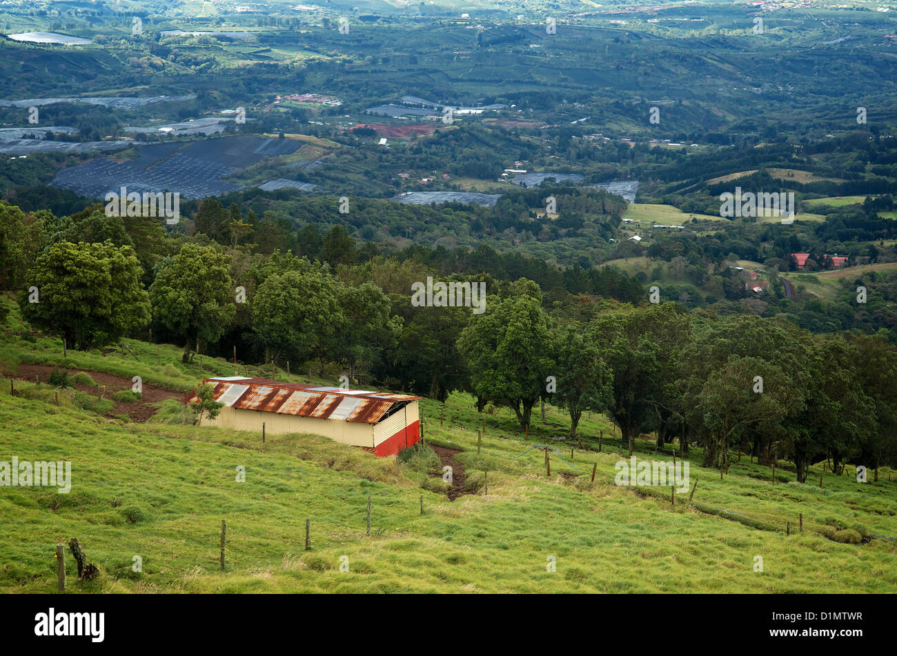 Tin roof shack in meadow on a hillside near Poas Lodge and Restaurant ...