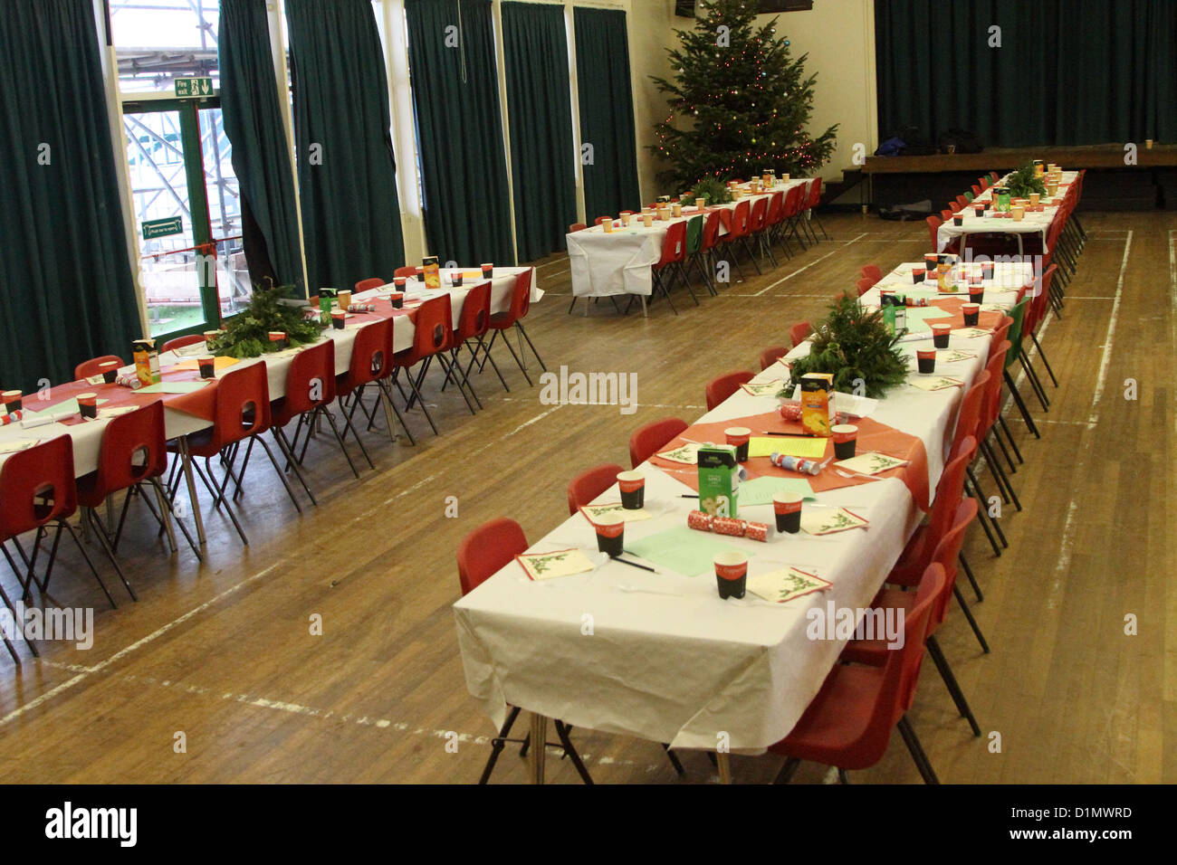 Community Christmas lunch tables set out ready for the 140 guests to ...