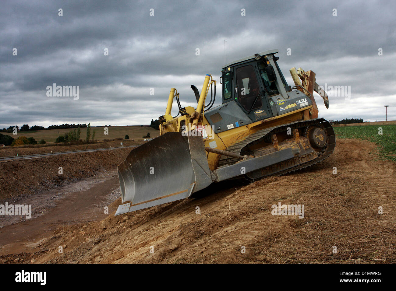 Bull Dozer construction machines on new motorway, buldozer Stock Photo ...
