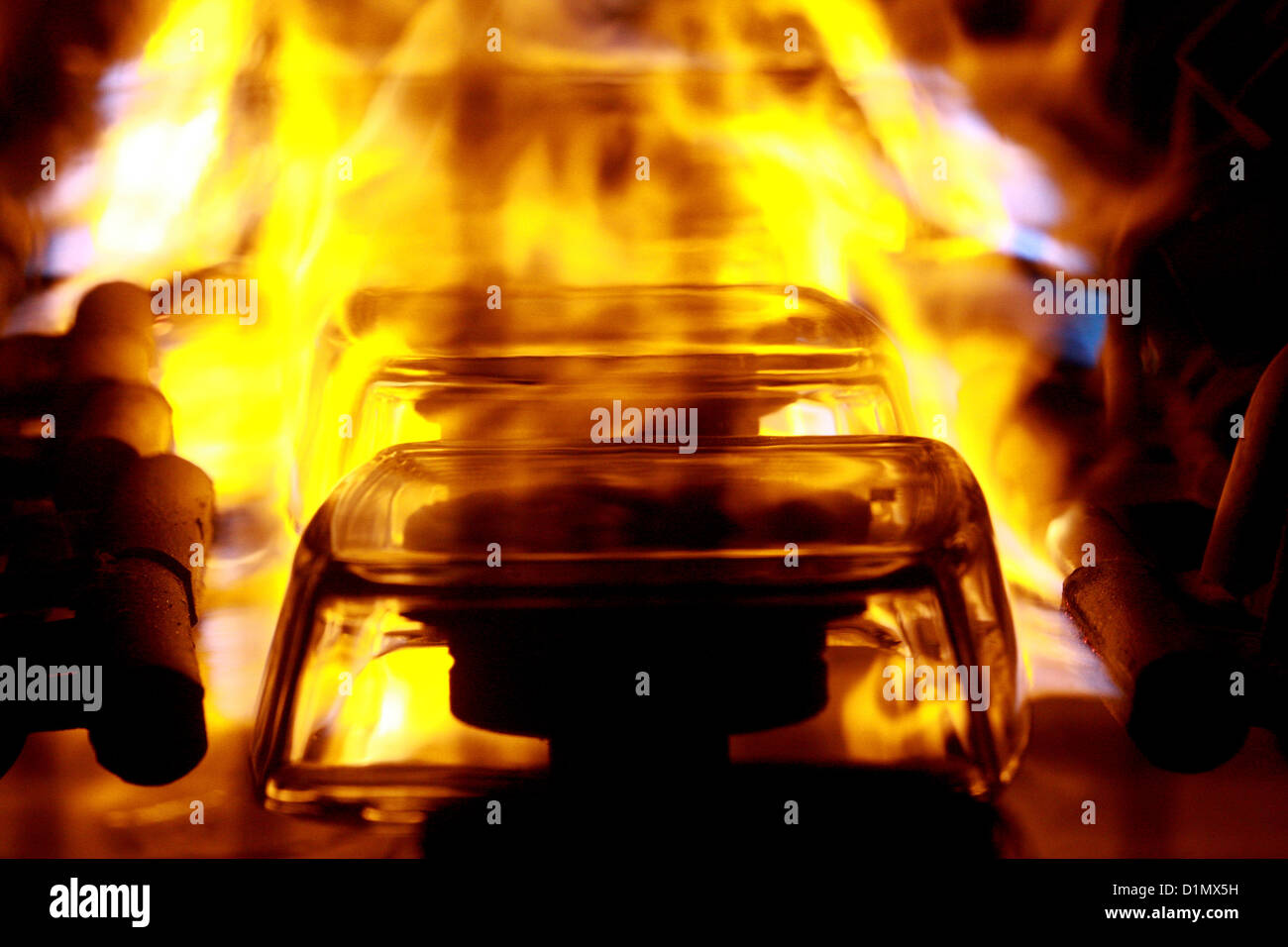 Glass factory, manufacture of boiling glass on the production line ...