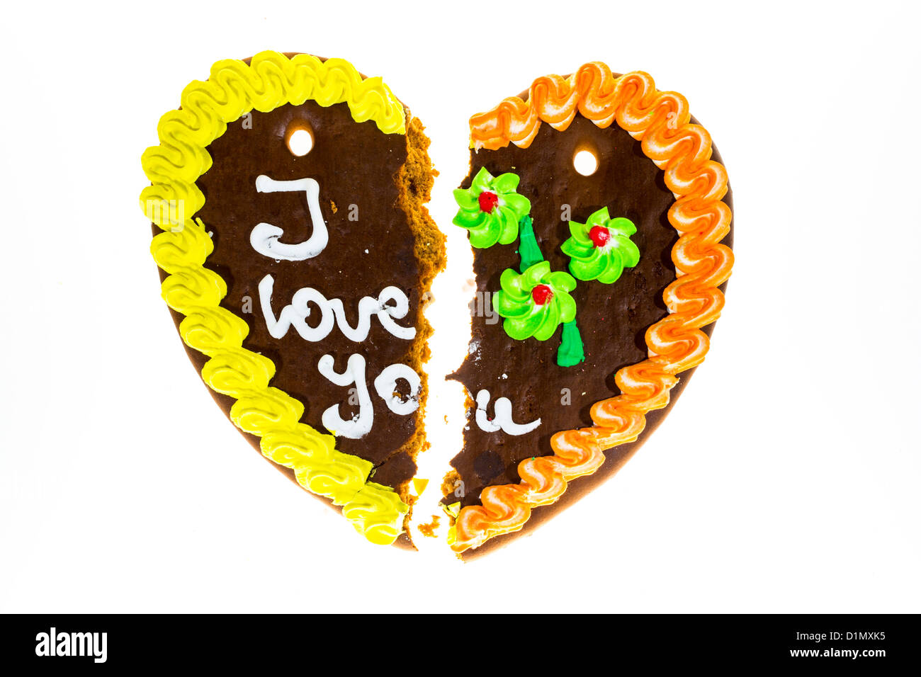 Gingerbread heart, broken into two pieces, symbol for finished love ...