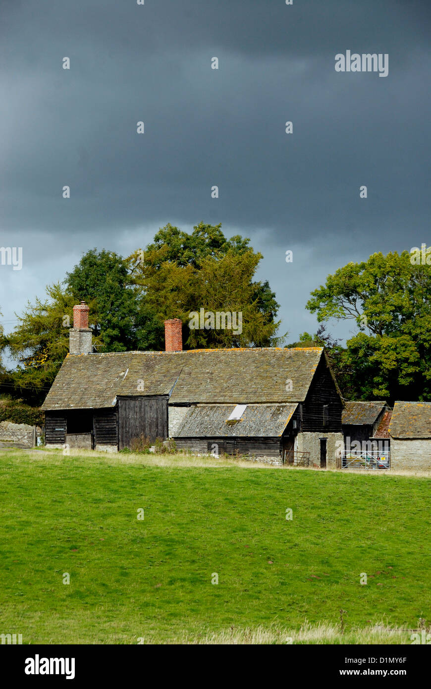 Rain clouds from a low weather front on countryside on Welsh-England ...