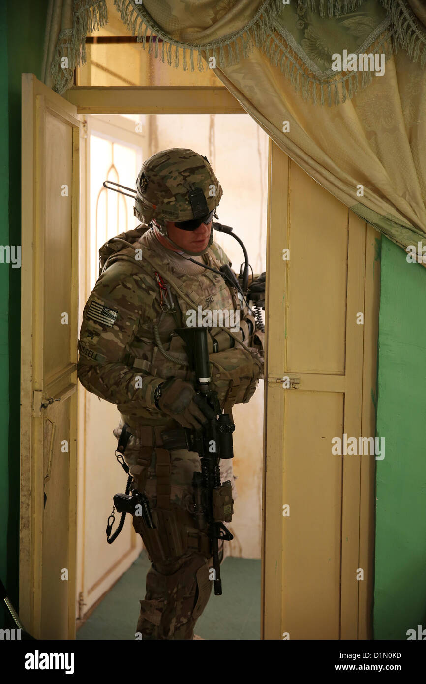 U.S. Army security force team member attends a mission debrief on OB ...