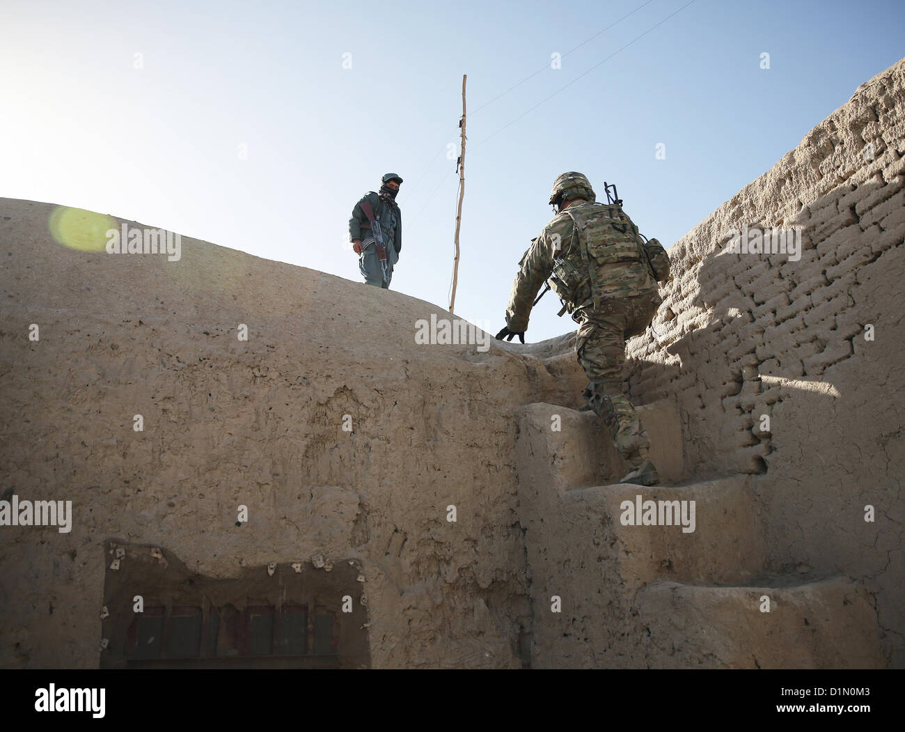 U.S. Army soldier attends a mission debrief after a key leader ...