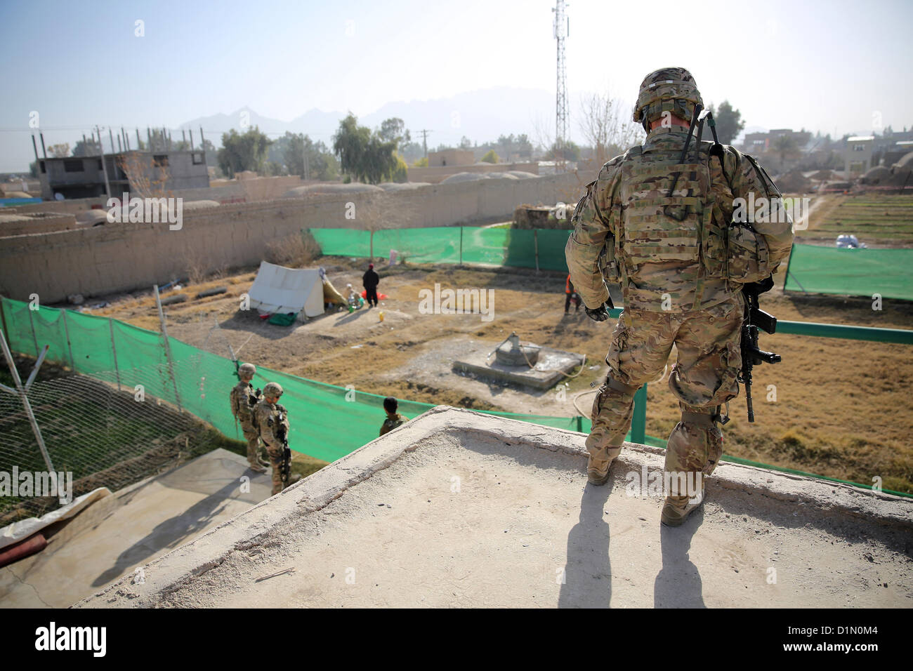 A member of the Provincial Reconstruction Team (PRT) Farah attends a ...