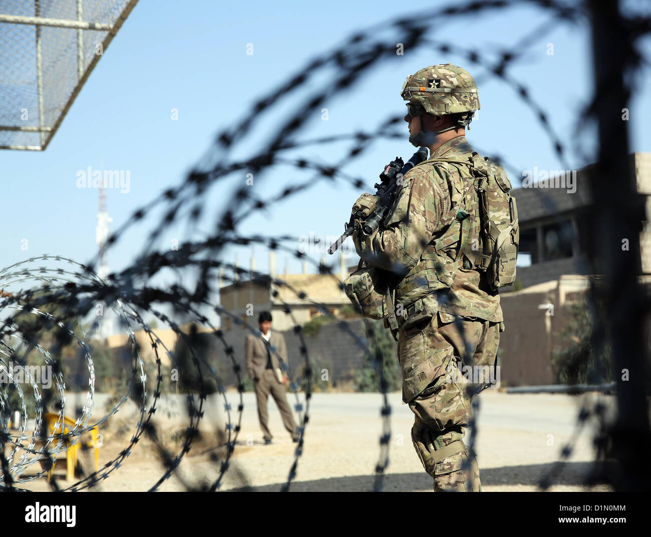 U.S. Army security force team member attends a mission debrief ...