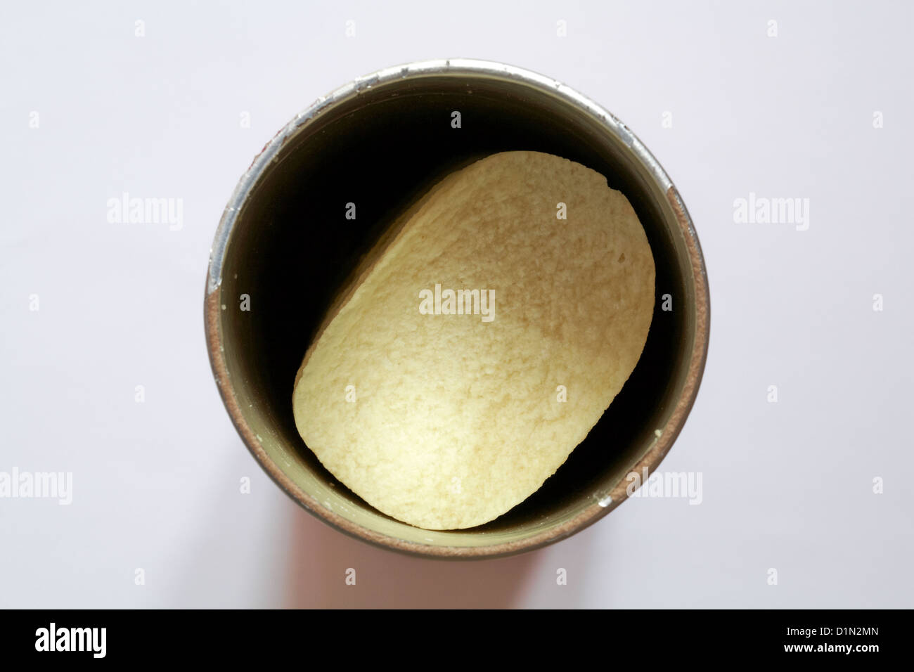 looking into a tub of Pringles original isolated on white background ...