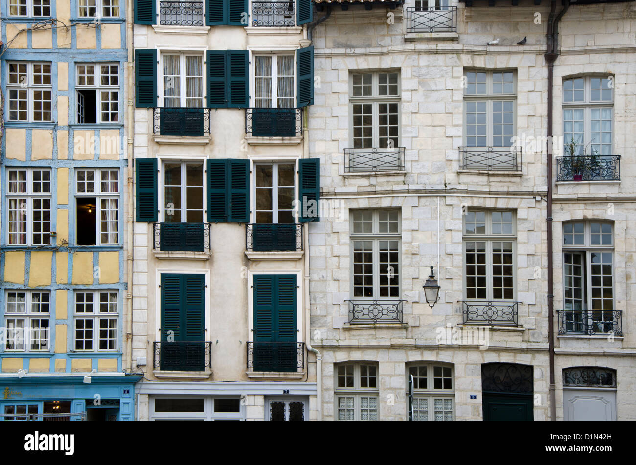 Facade at Petit Bayonne neighborhood, Nive river with ancient buildings ...
