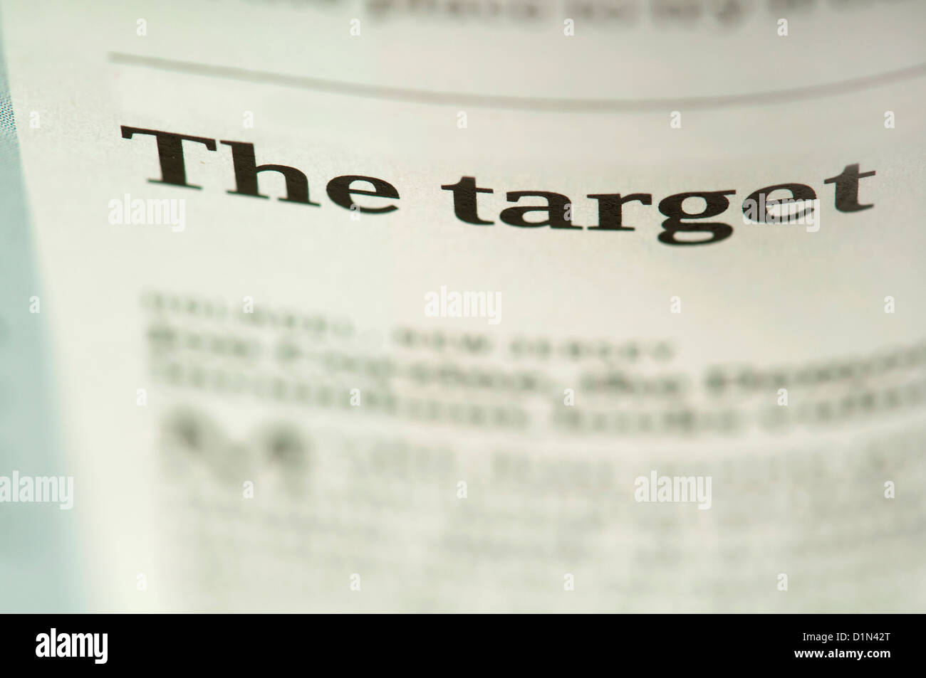 Word The target on newspaper Stock Photo - Alamy
