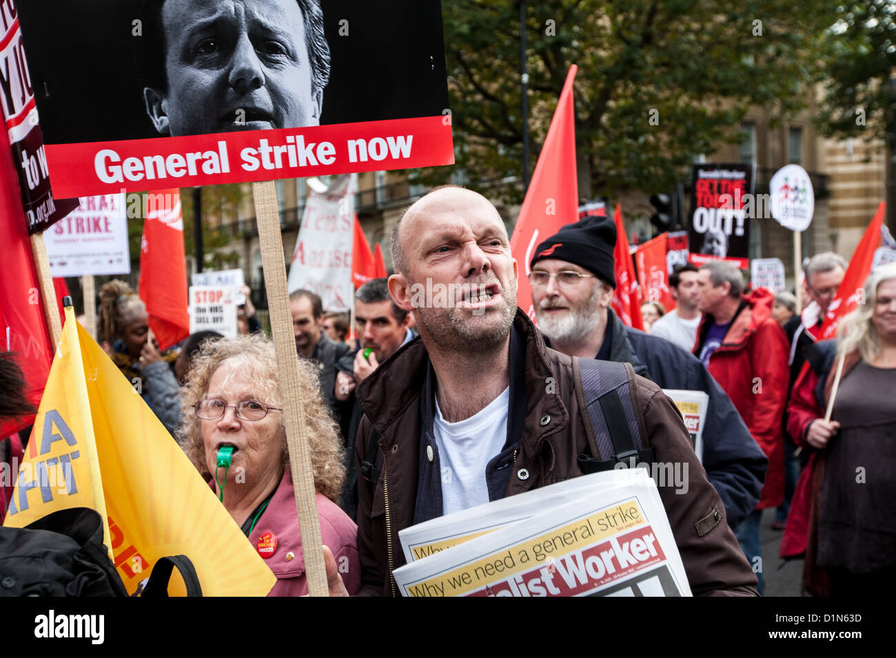 Angry protester shouting at Downing St against austerity cuts Stock ...