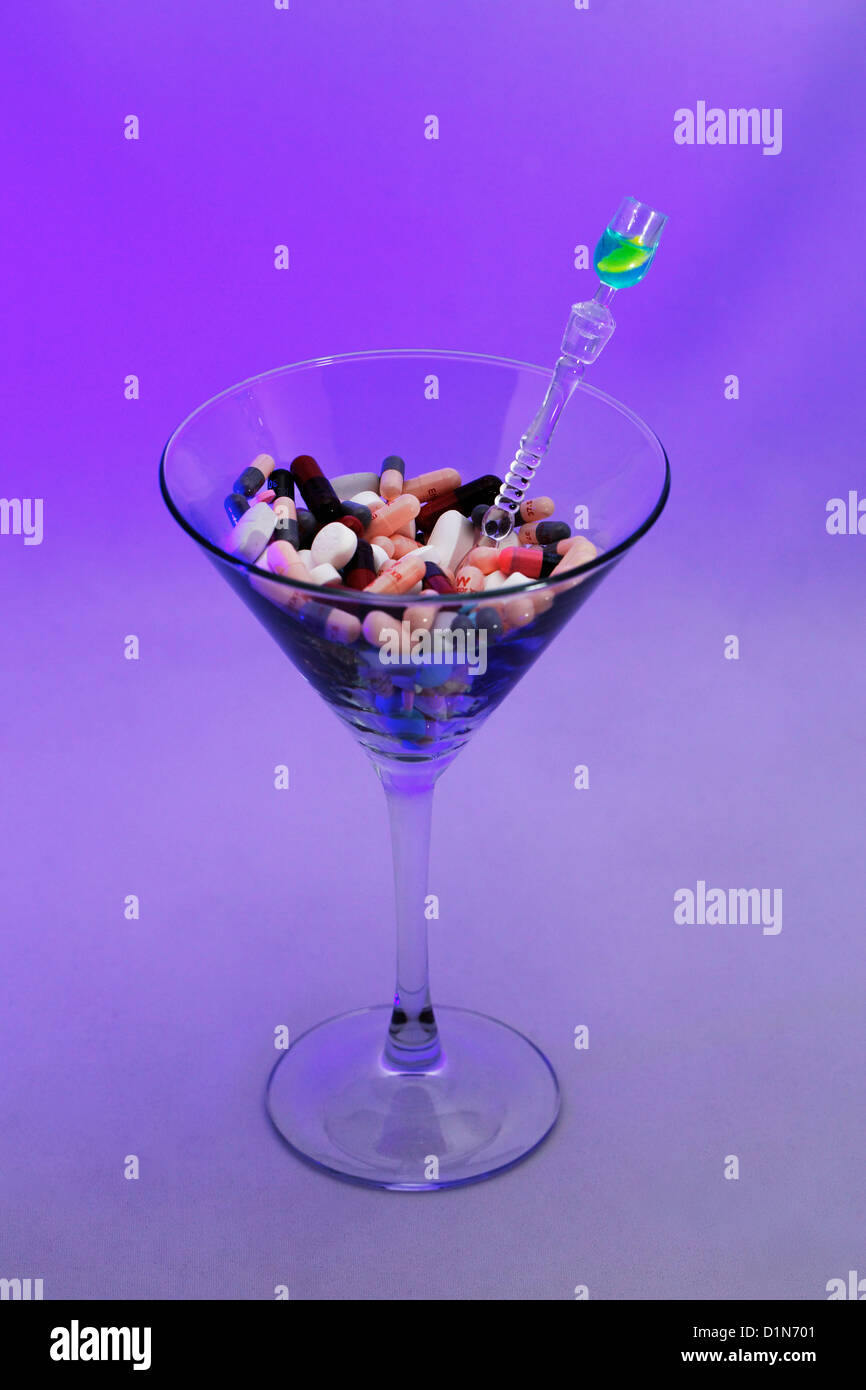 Prescription pills, tablets, capsules and martini glass. Lavender ...