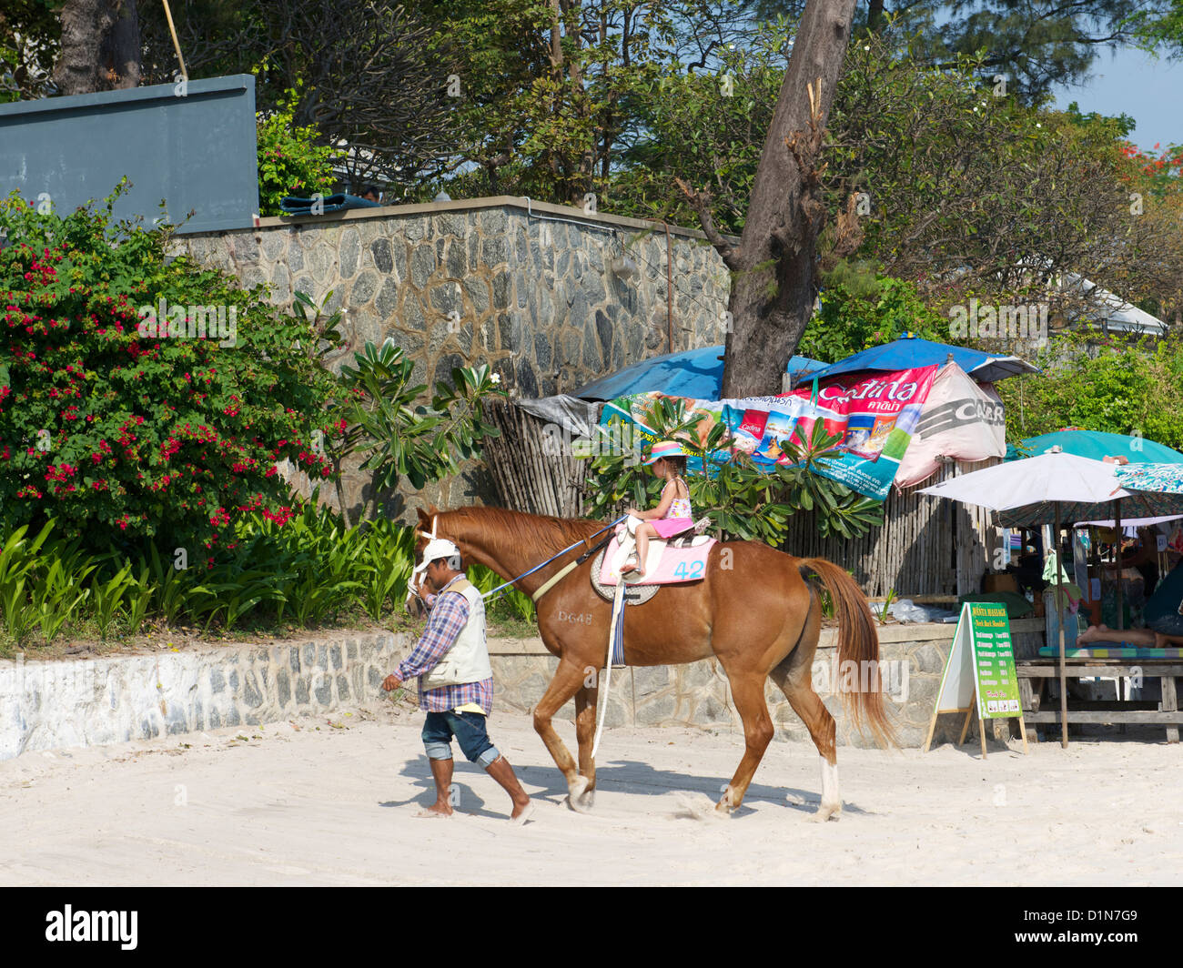Pony trek on beach hi-res stock photography and images - Alamy