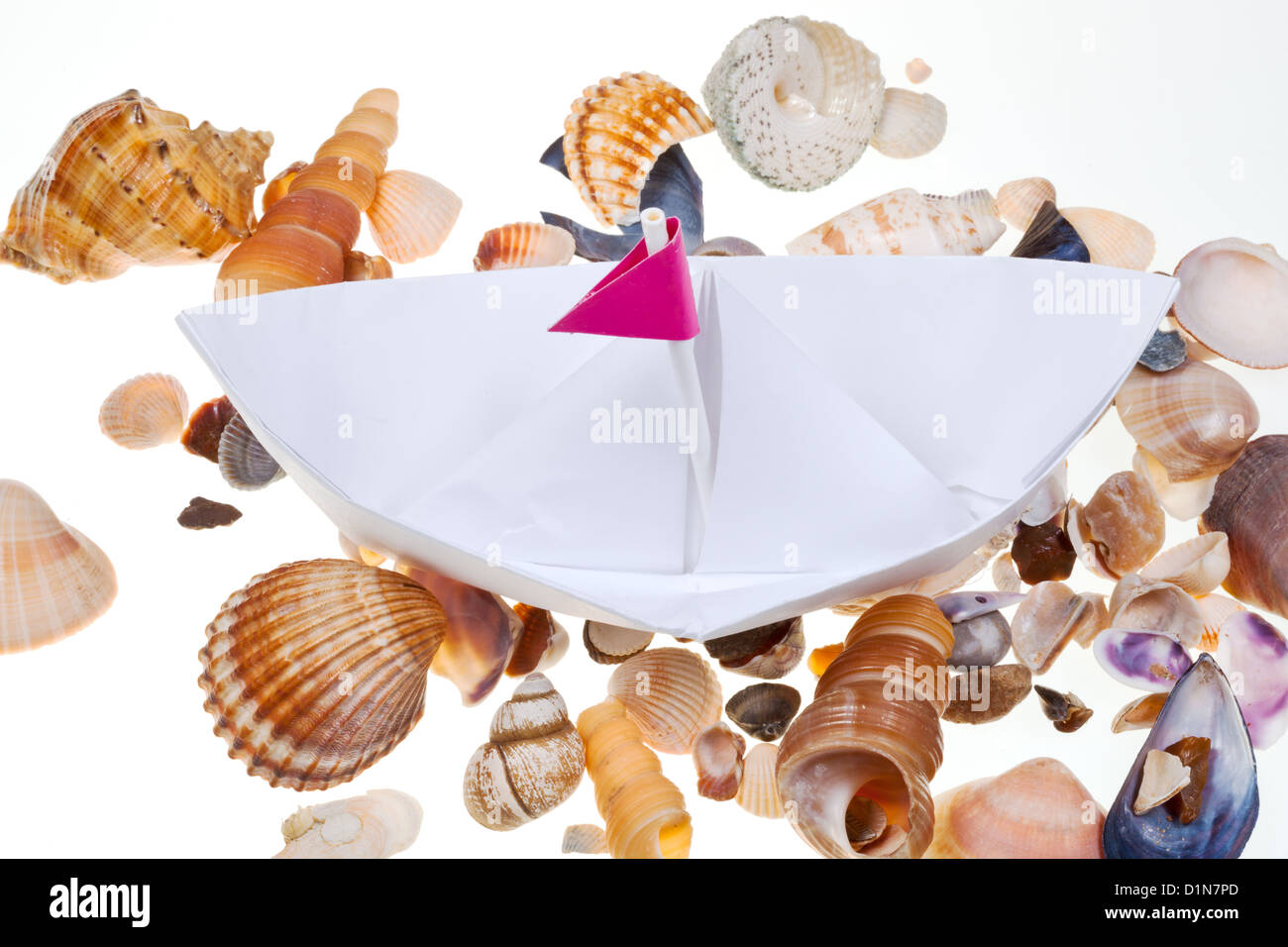 hand made paper boat on background from sea shells Stock Photo - Alamy