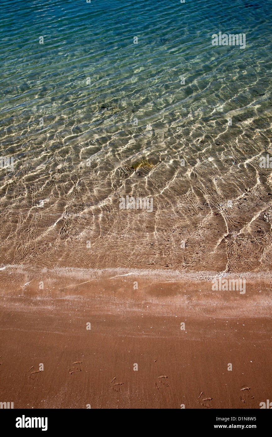 A background of sun and shadows on sandy ocean floor Stock Photo - Alamy