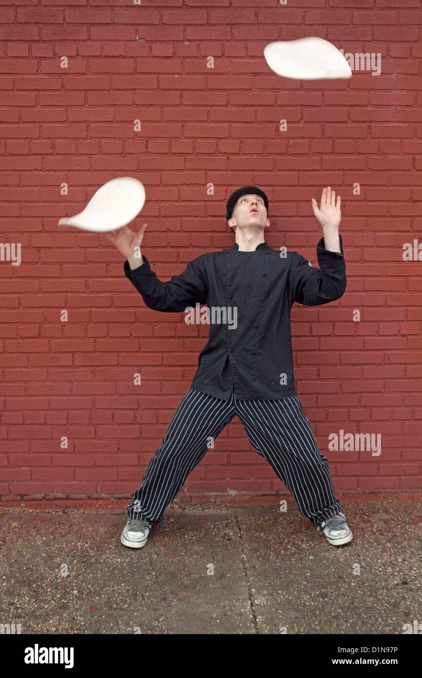 chef throwing pizza dough Stock Photo - Alamy