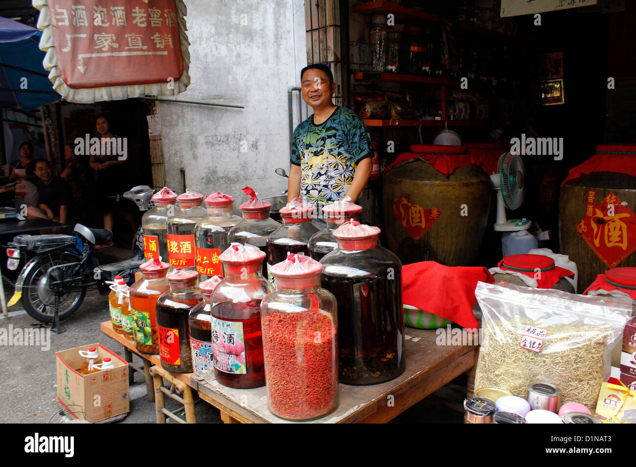 chinese man makes natural flavored booze alcohol Baijiu drinks made in ...