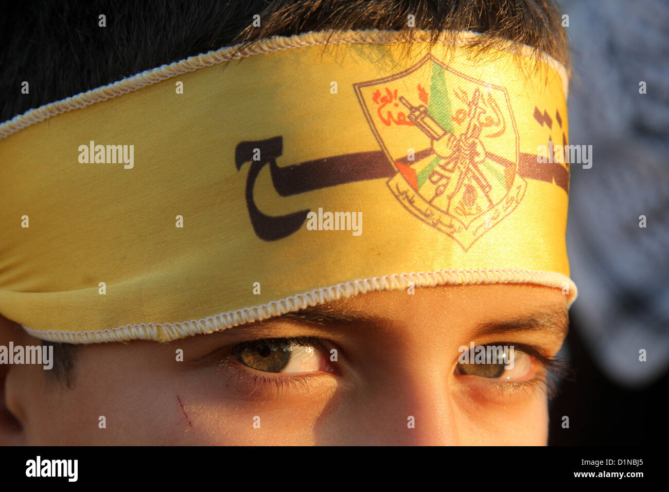 Palestinian child wears hamas headband hi-res stock photography and ...
